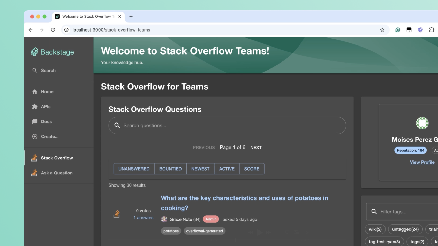 A screenshot displaying the interface of "Stack Overflow Teams" integrated into the Backstage platform. The webpage welcomes the user with a banner reading "Welcome to Stack Overflow Teams! Your knowledge hub." The interface shows a search bar for questions under "Stack Overflow Questions," with filters such as "Unanswered," "Bountied," "Newest," "Active," and "Score." Below, a question appears: "What are the key characteristics and uses of potatoes in cooking?" with tags such as "potatoes" and "overflowai-generated." On the right, a user profile of "Moises Perez G" with a reputation score of 184 is visible, along with tag filters below it. The left sidebar contains menu options like "Home," "APIs," "Docs," "Create," and "Stack Overflow."